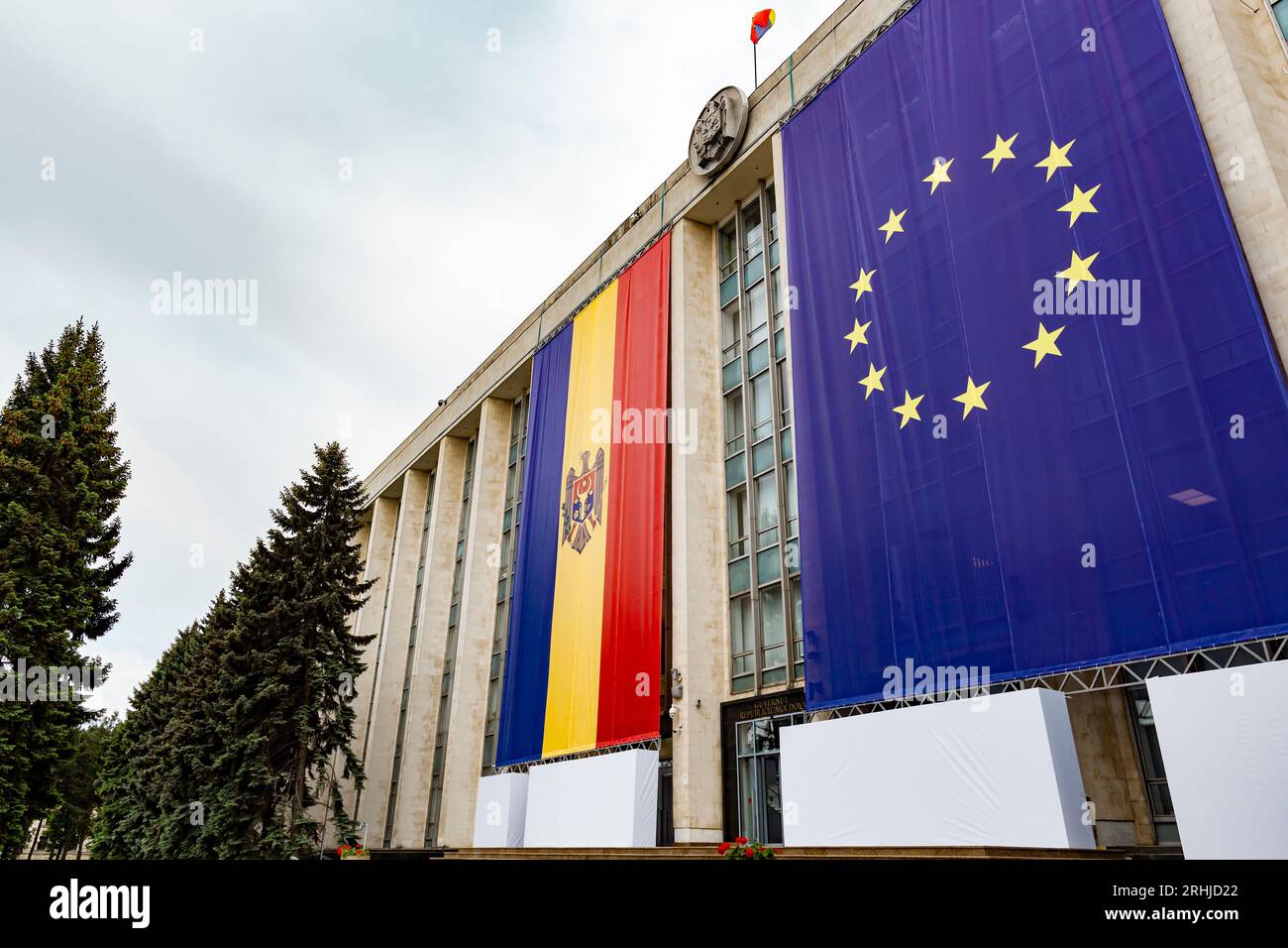 Large flags of Moldova and the European Union on the building of the ...