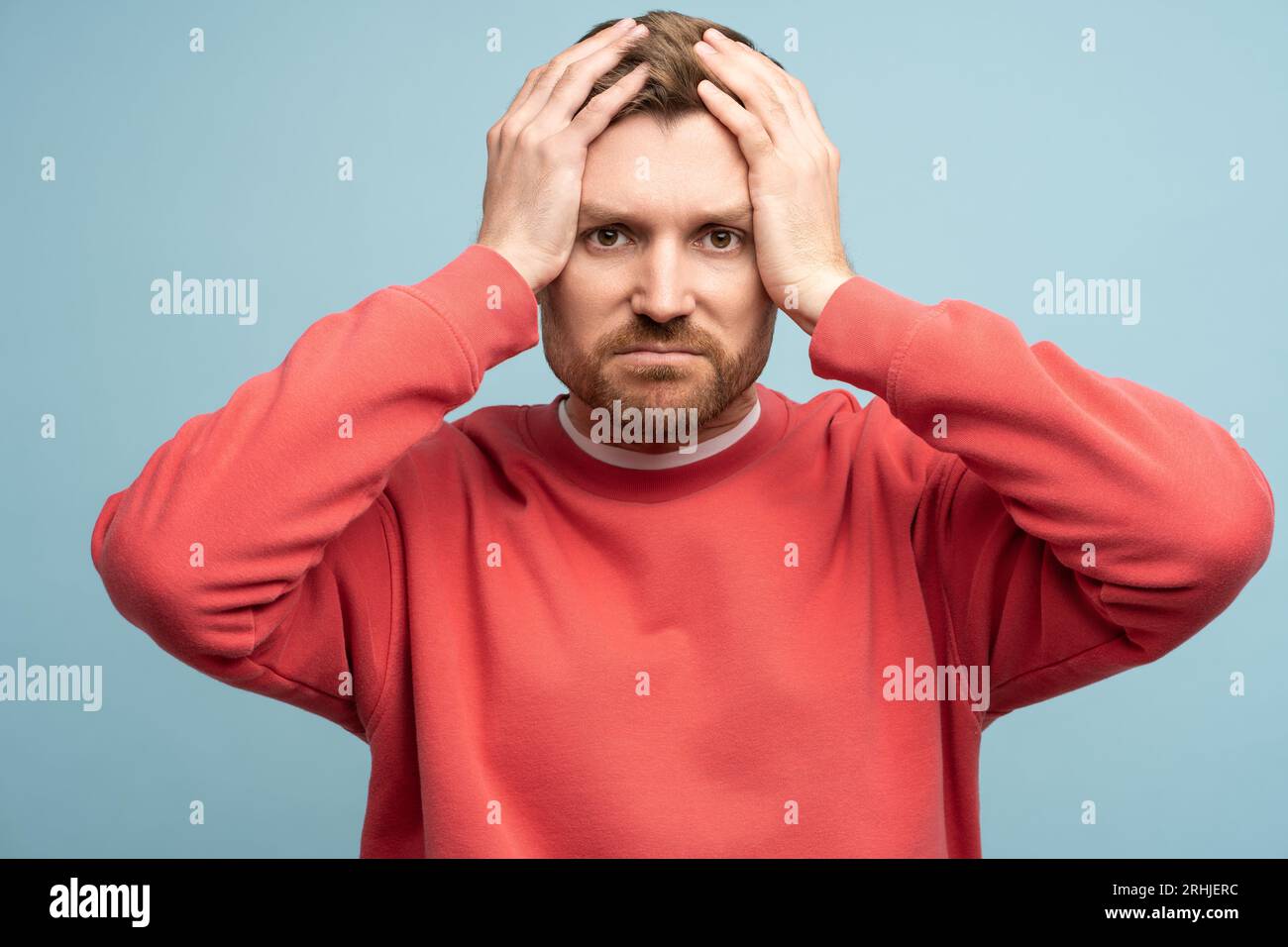 Frustrated worried man holds head concerns about difficult life problem ...