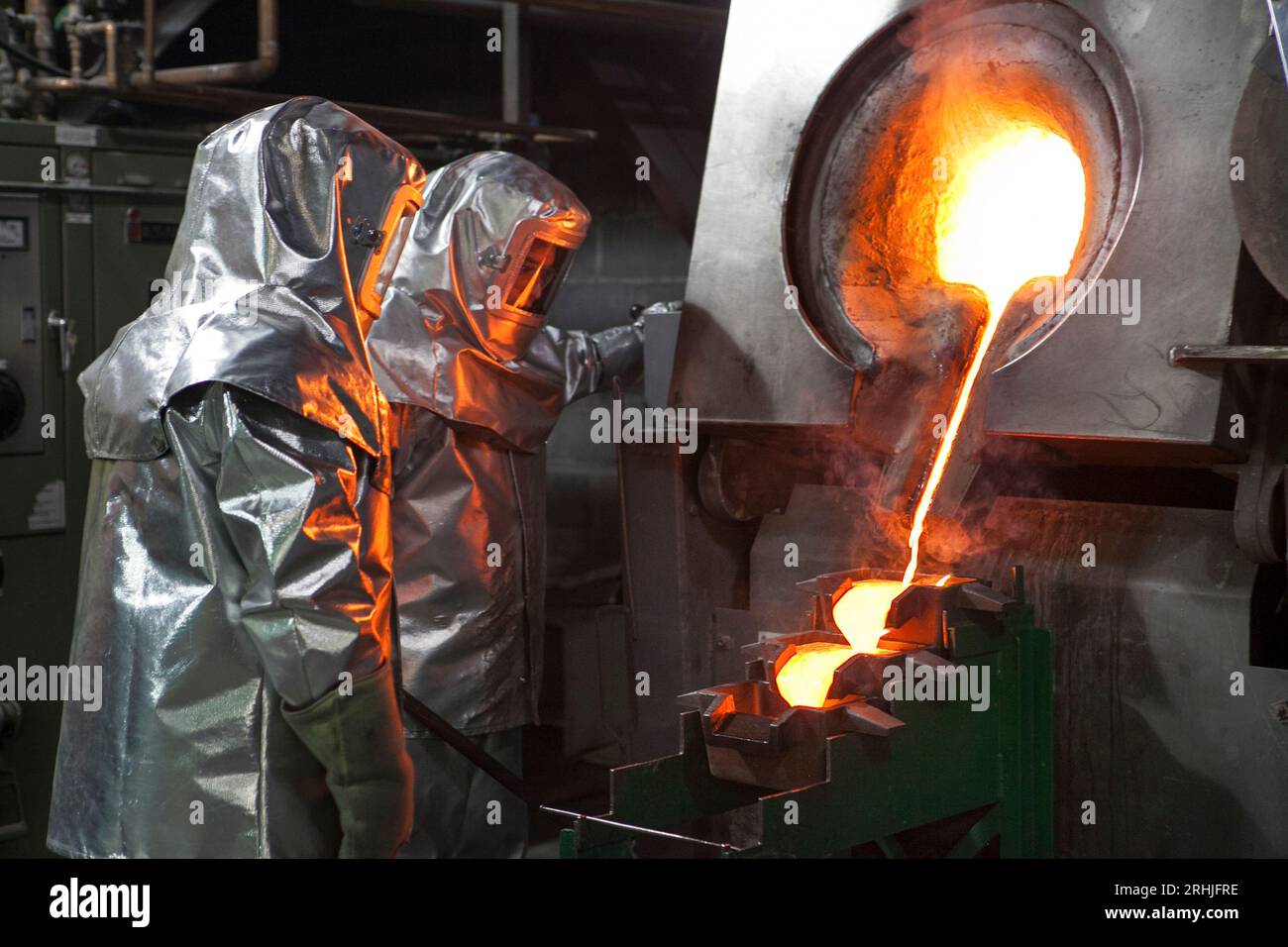 Pouring gold doré bars at the Kumtor gold mine in Kyrgyzstan Stock ...