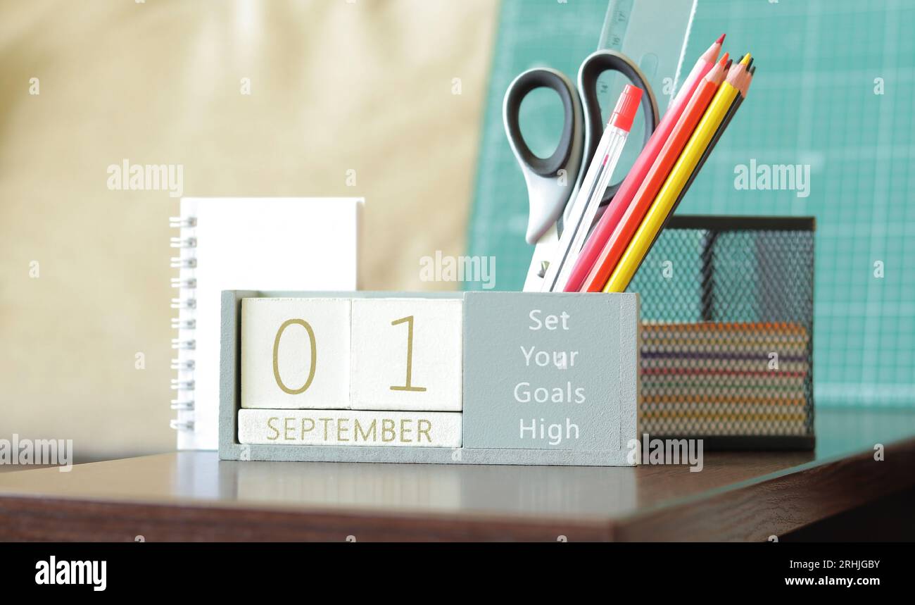Calendar, September 1st. Back to school. Wooden perpetual block ...