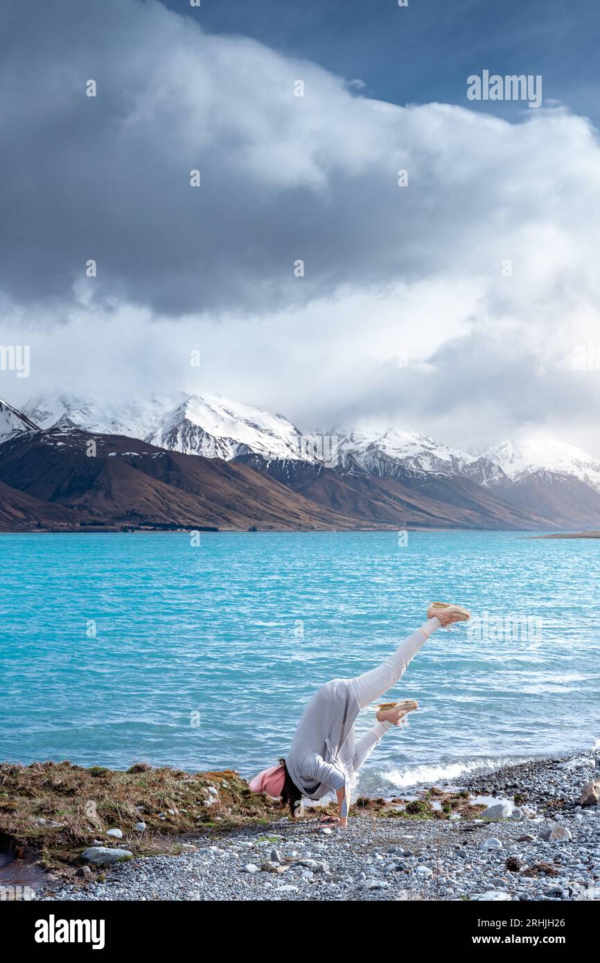 Asian female yogi practice yoga at the beautiful scenic sunrise view of ...