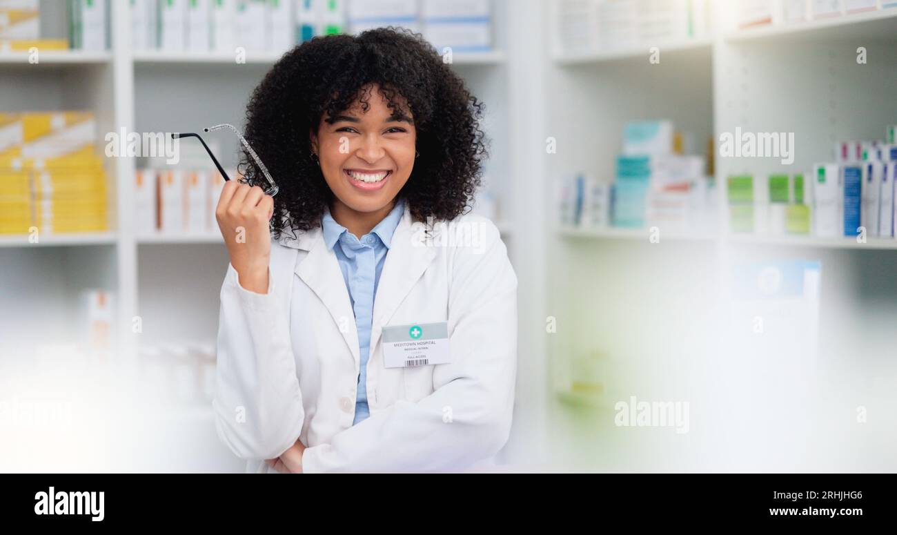 A friendly female pharmacist with a bright smile is about to help ...