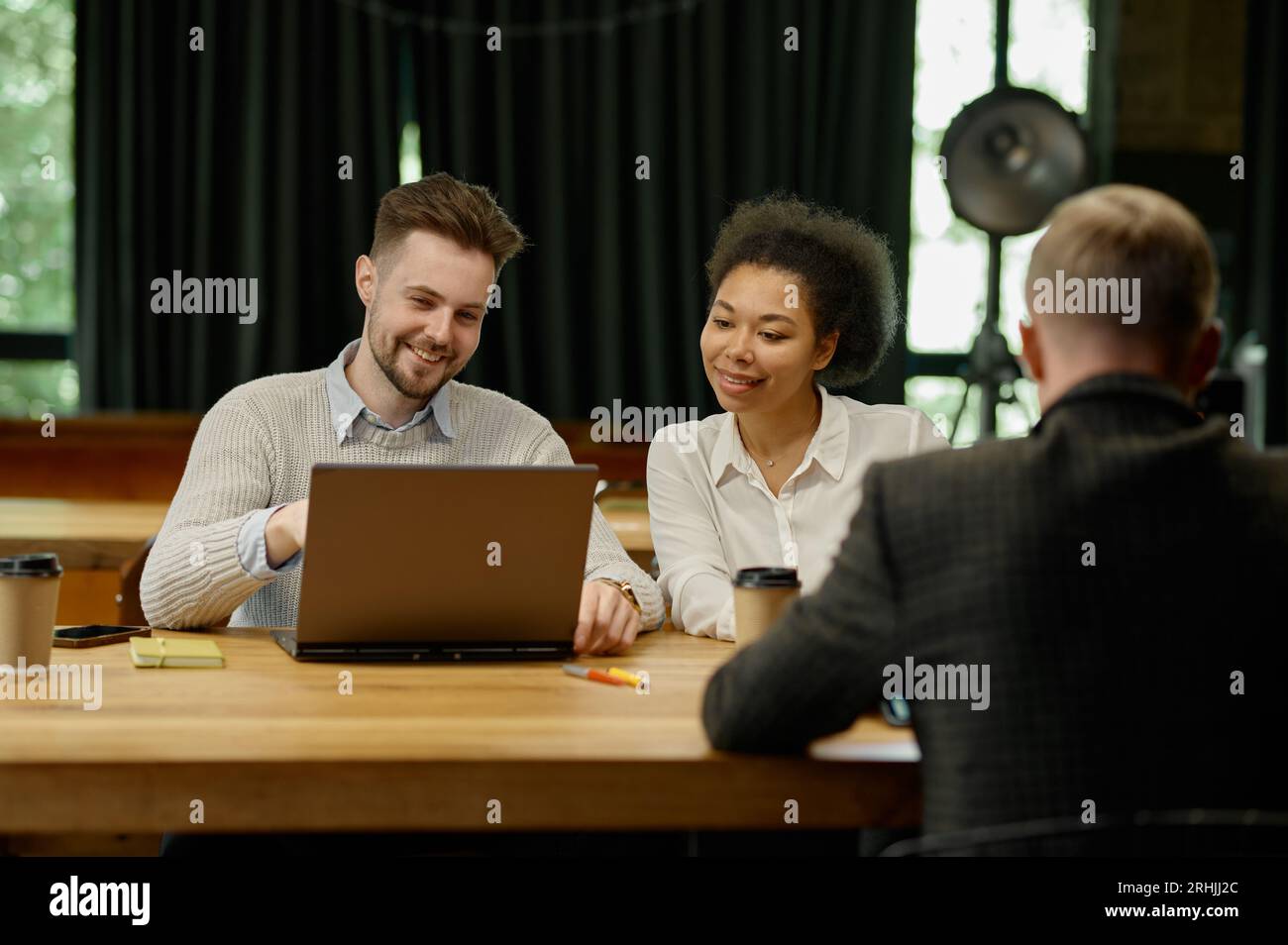 Business team talking, working together at coworking office open space ...
