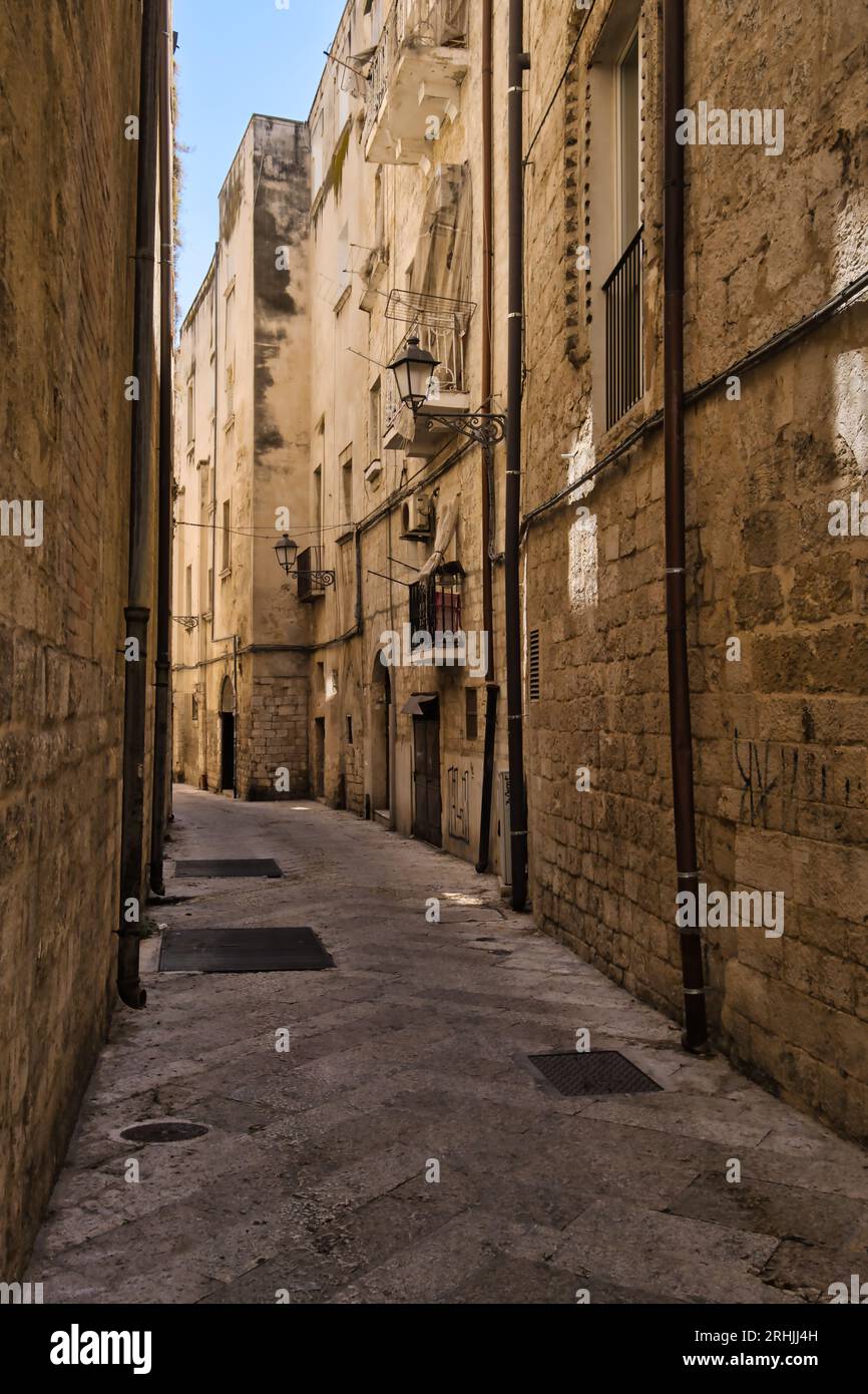 View of an alley in old Bari Stock Photo - Alamy
