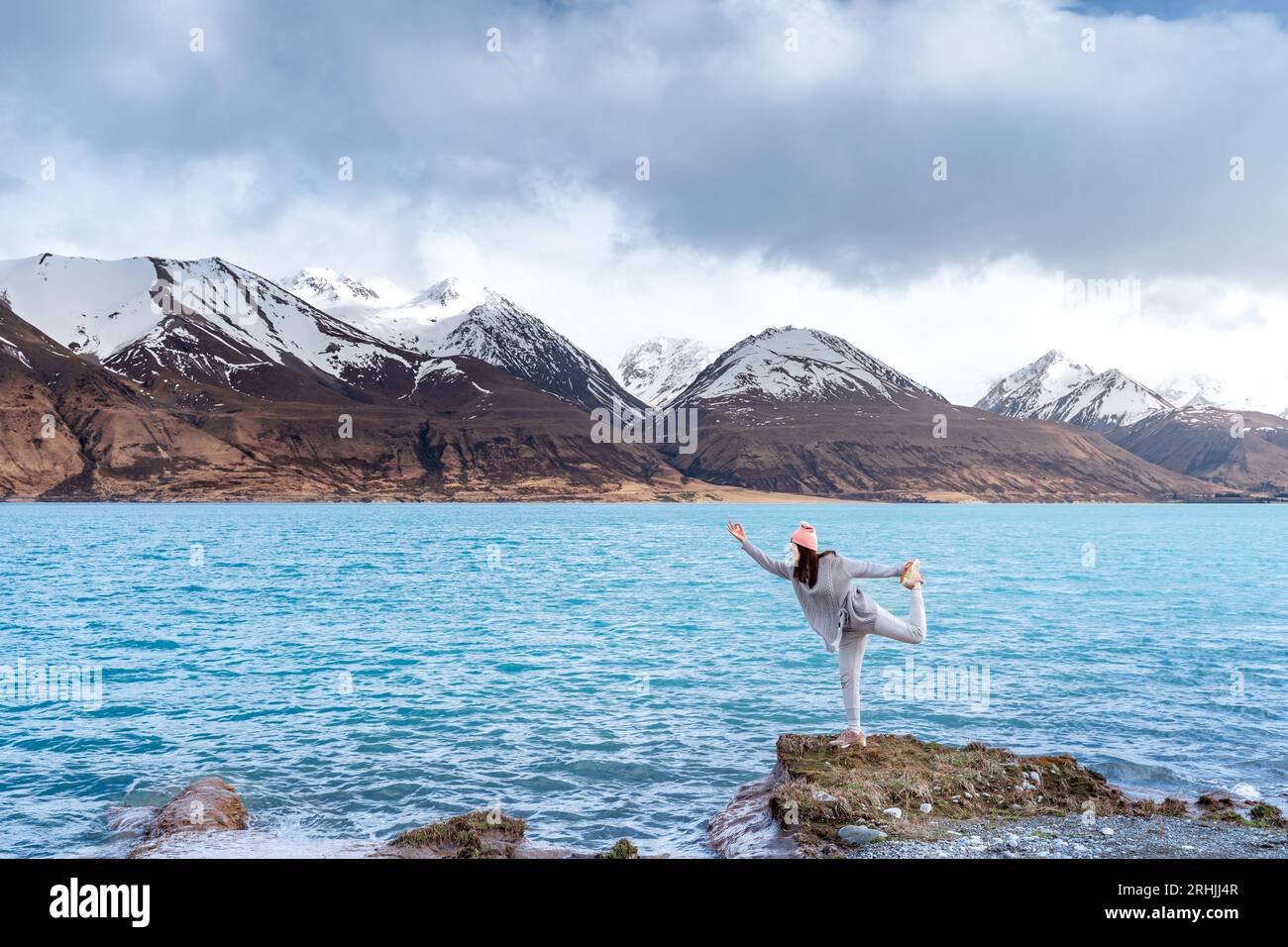 Asian female yogi practice yoga at the beautiful scenic sunrise view of ...