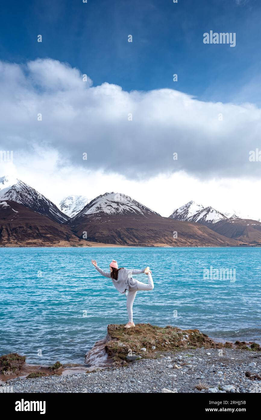 Asian female yogi practice yoga at the beautiful scenic sunrise view of ...