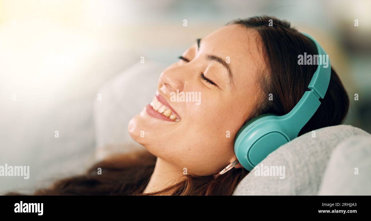 Relax, headphones and happy woman listening to music, radio or podcast ...