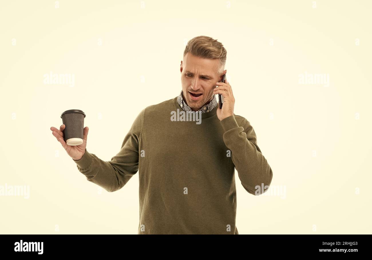 emotional man has call at coffee break on background. photo of man has ...