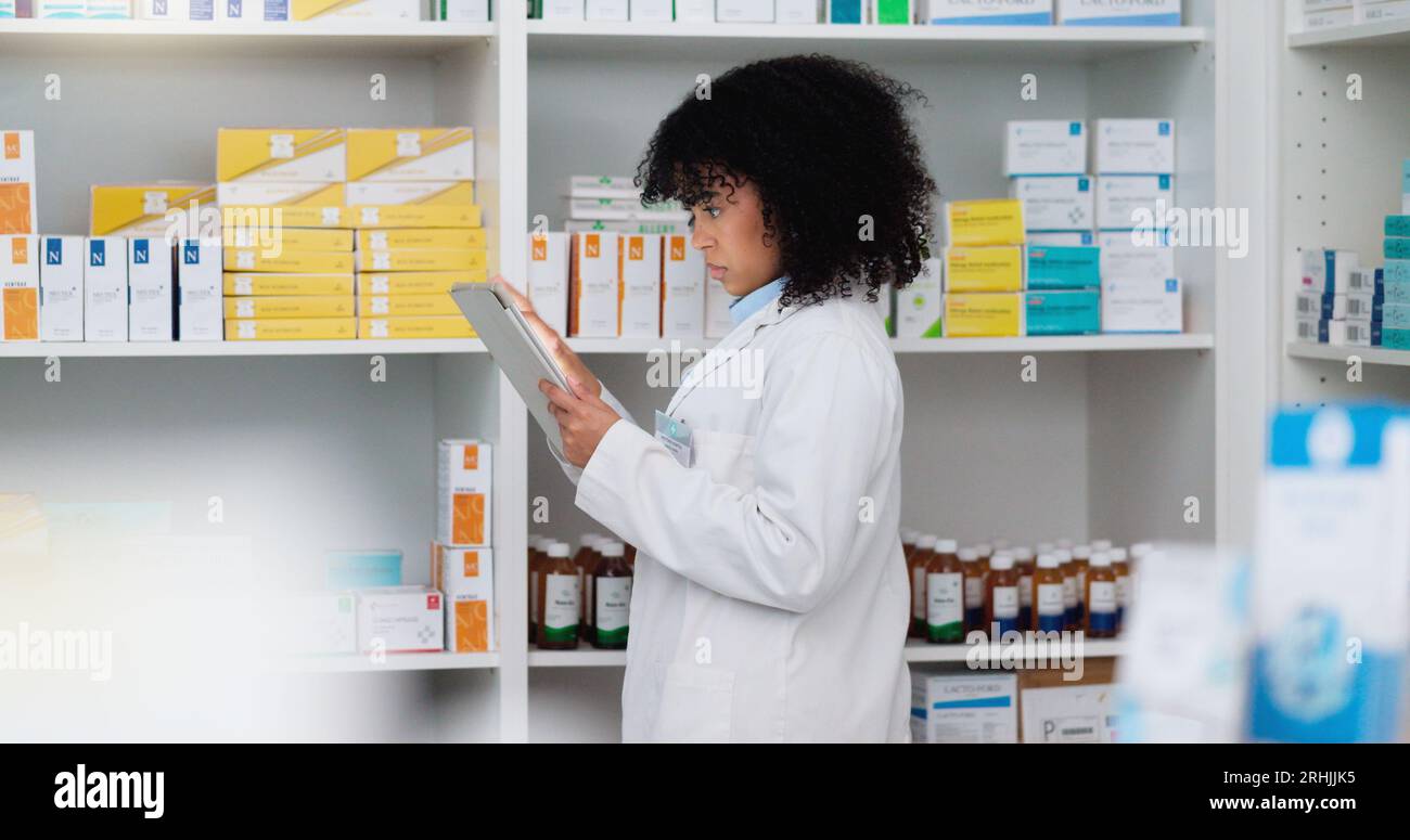 Female pharmacist taking inventory hi-res stock photography and images ...