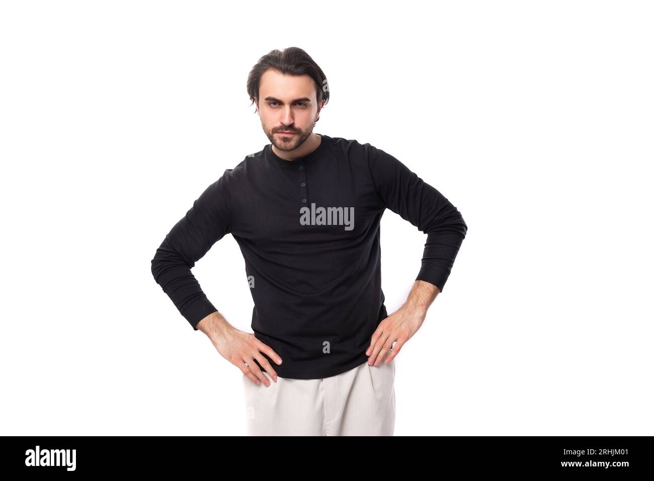 authentic brutal macho man with black hair and beard with an earring in ...