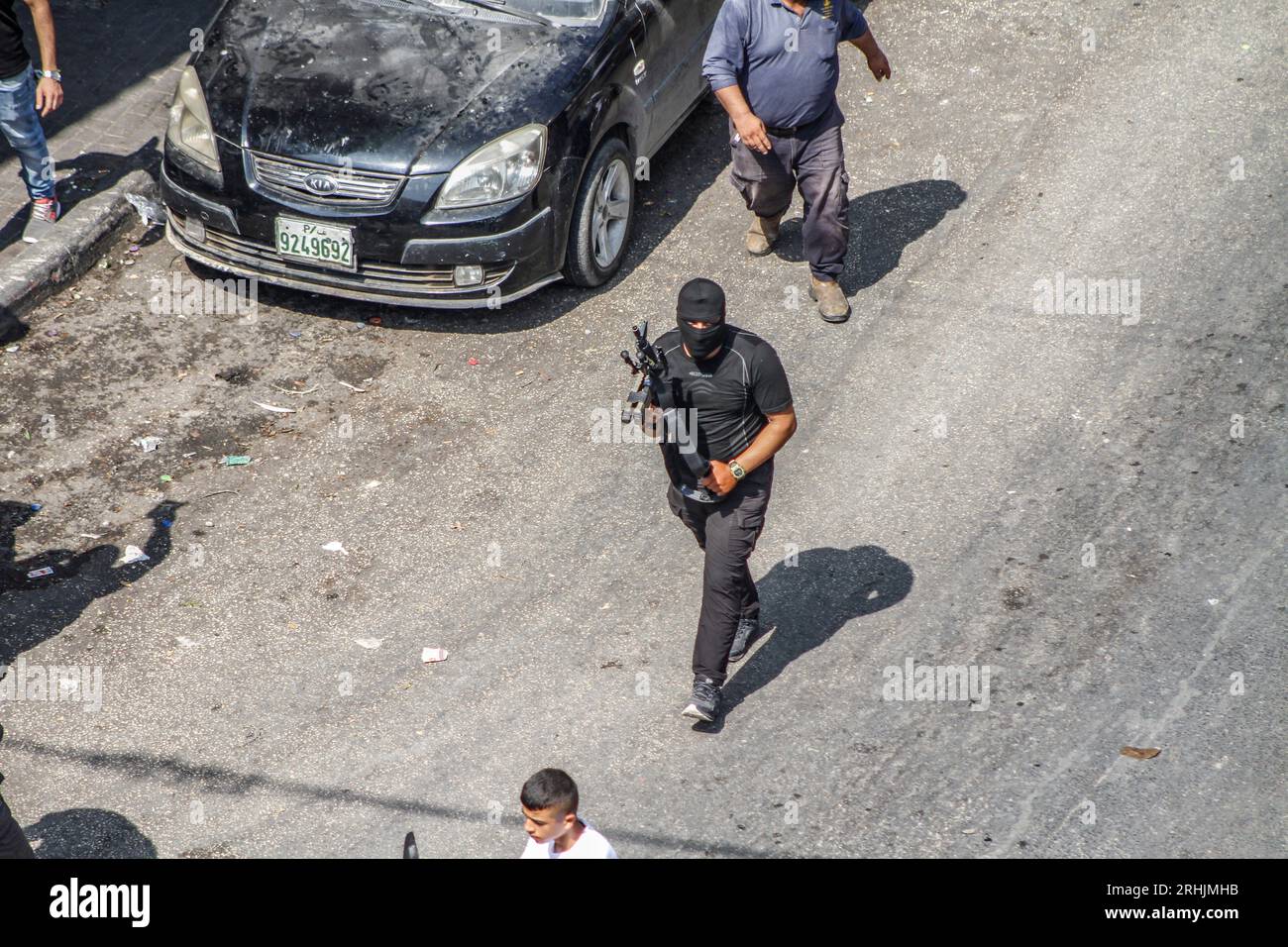 Jenin, Palestine. 17th Aug, 2023. A masked gunman seen during the ...