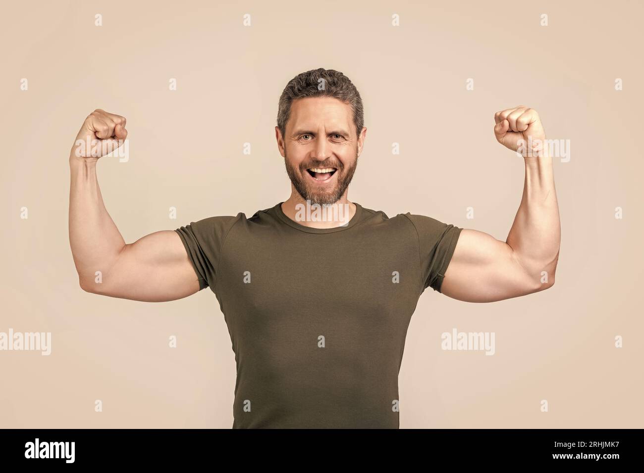 Muscular man shouting flexing muscles hi-res stock photography and ...