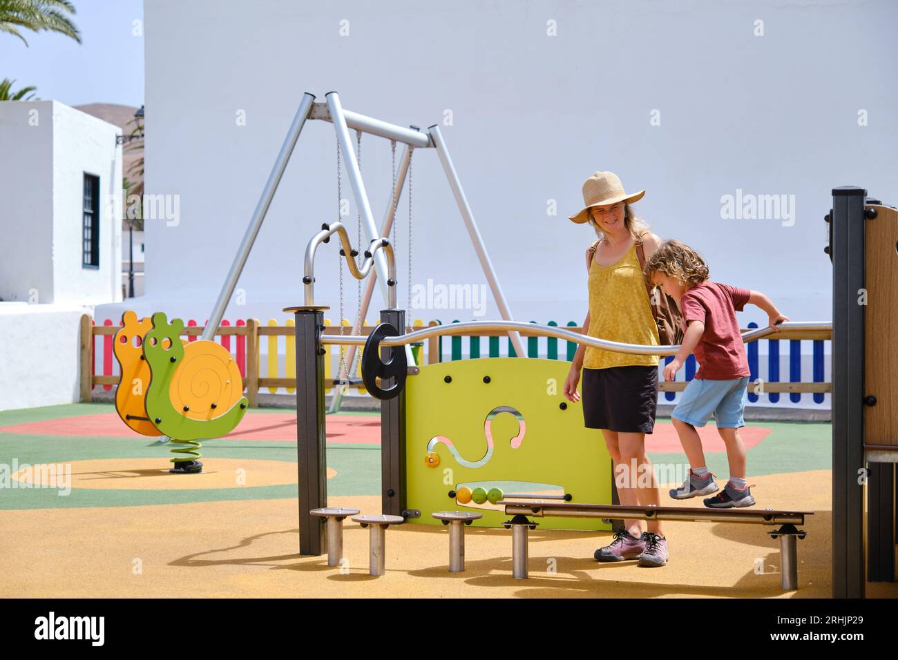 Mother and son playing on playground Stock Photo - Alamy