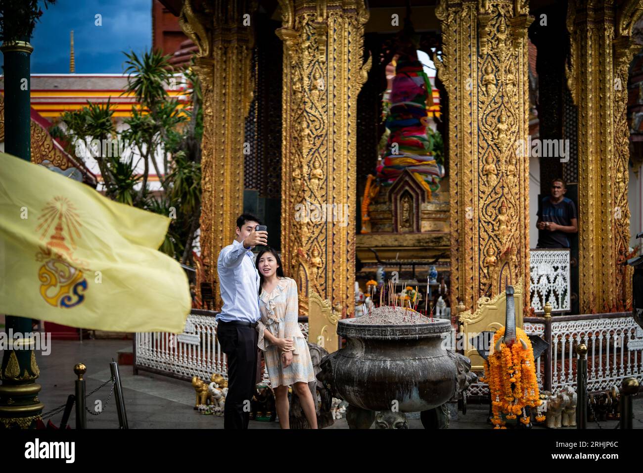 People take a selfie after praying at Wat Na Pradu in the Na Pradu sub ...
