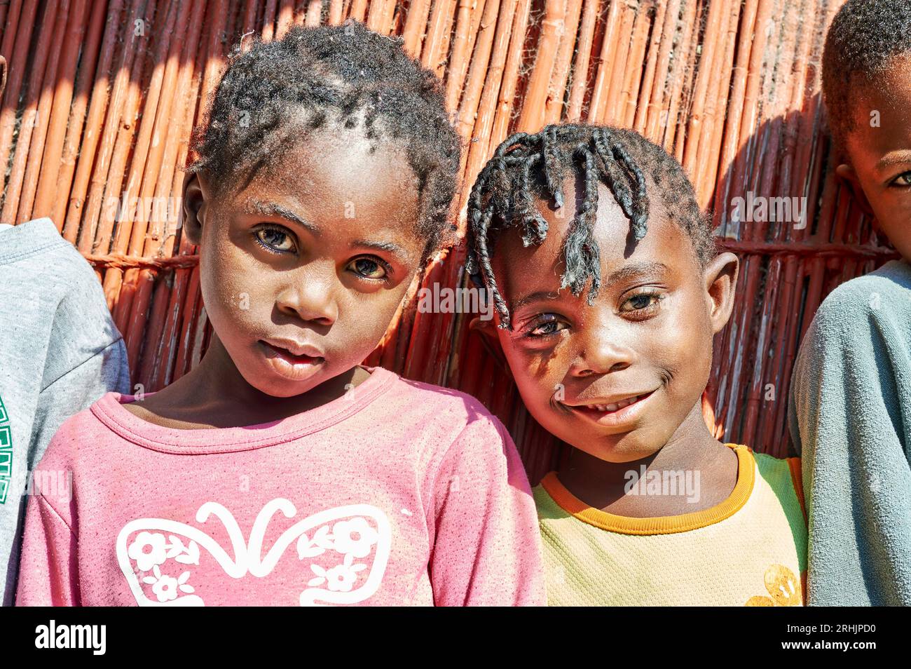 Namibia. Portrait of two joyful children in Kavango Region Stock Photo ...