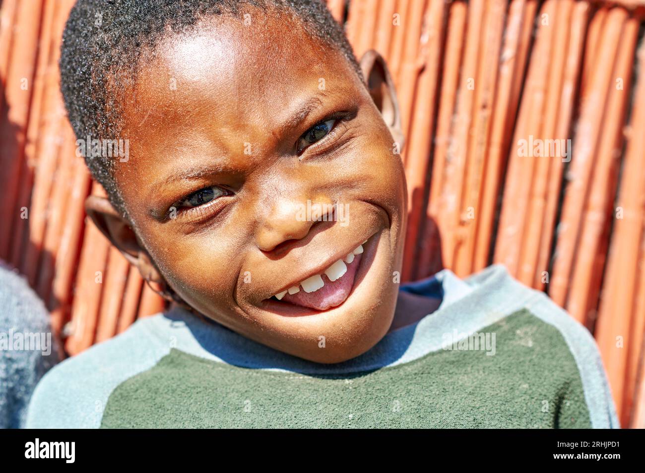 Namibia. Portrait of a joyful child in Kavango Region Stock Photo - Alamy