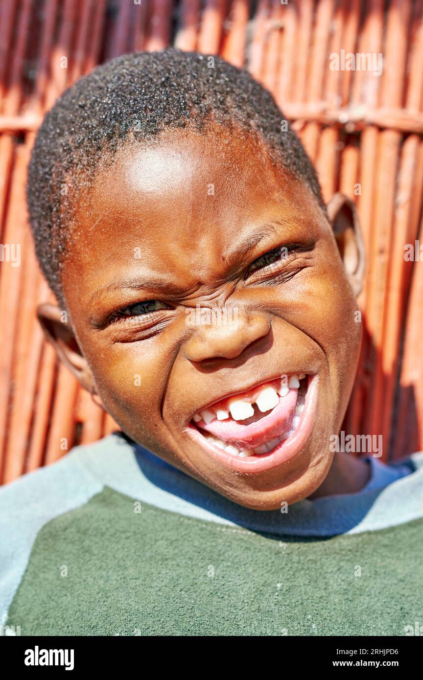 Namibia. Portrait of a joyful child in Kavango Region Stock Photo - Alamy