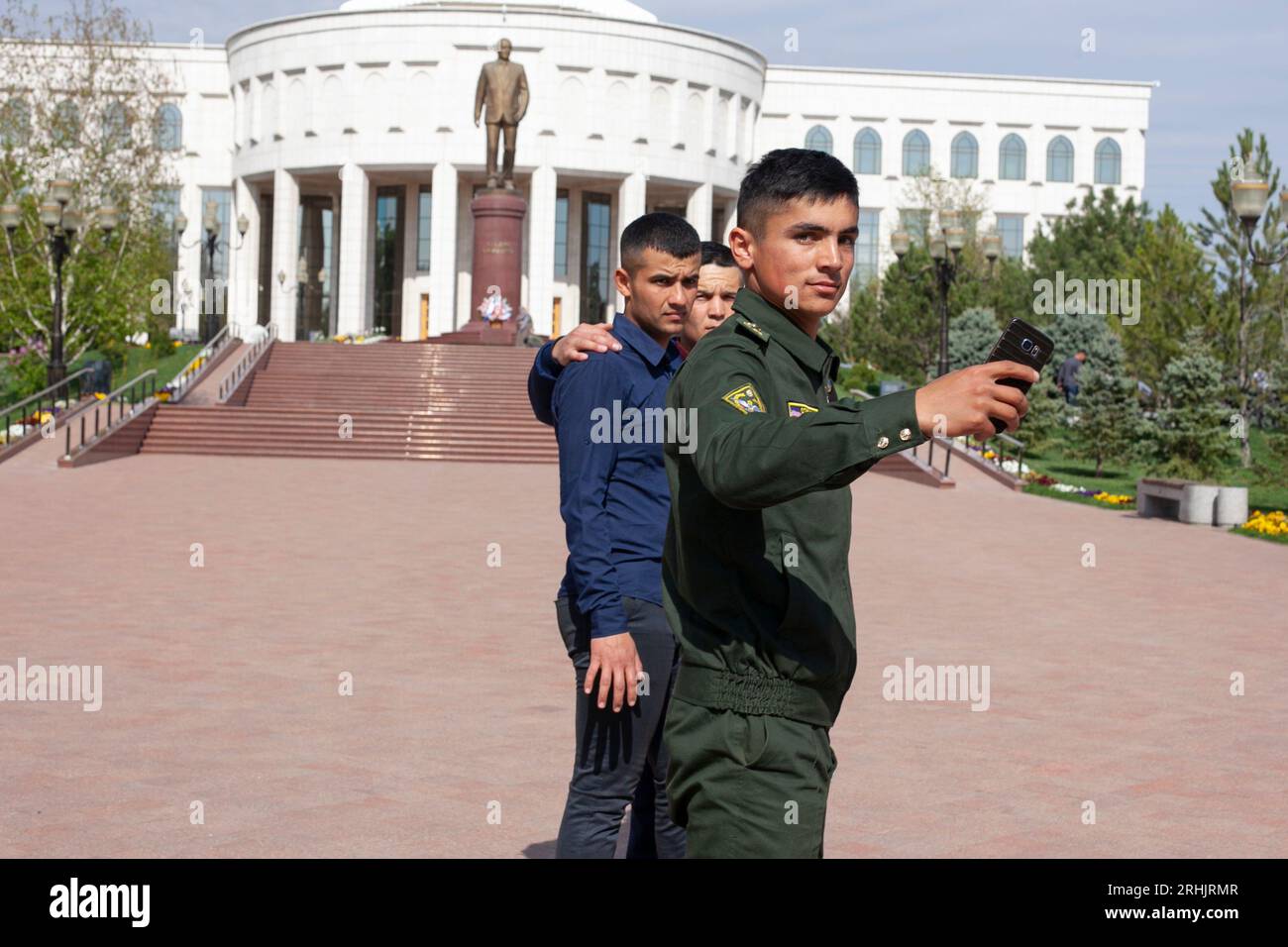Uzbek soldiers take a selfie outside the museum to former President Islam Karimov Stock Photo ...