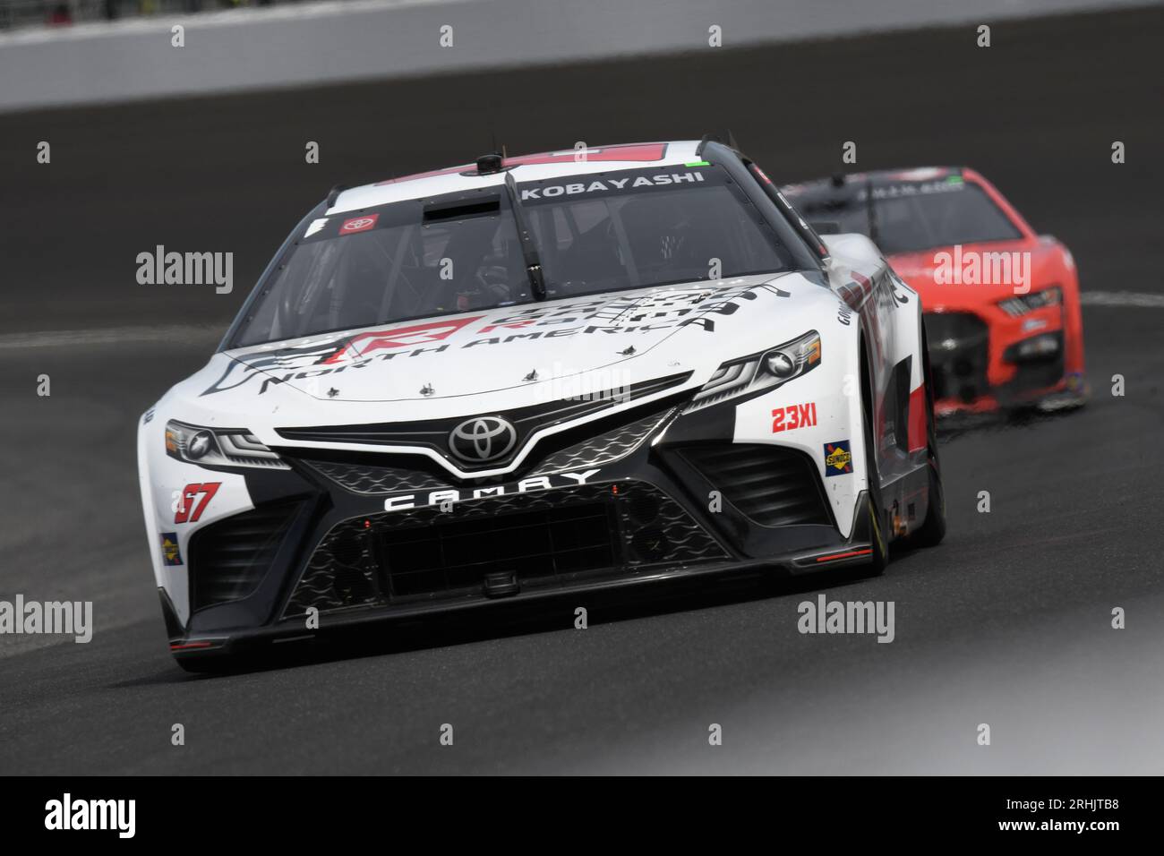INDIANAPOLIS, IN - AUGUST 13: Kamui Kobayashi (#67 23XI Racing Toyota ...