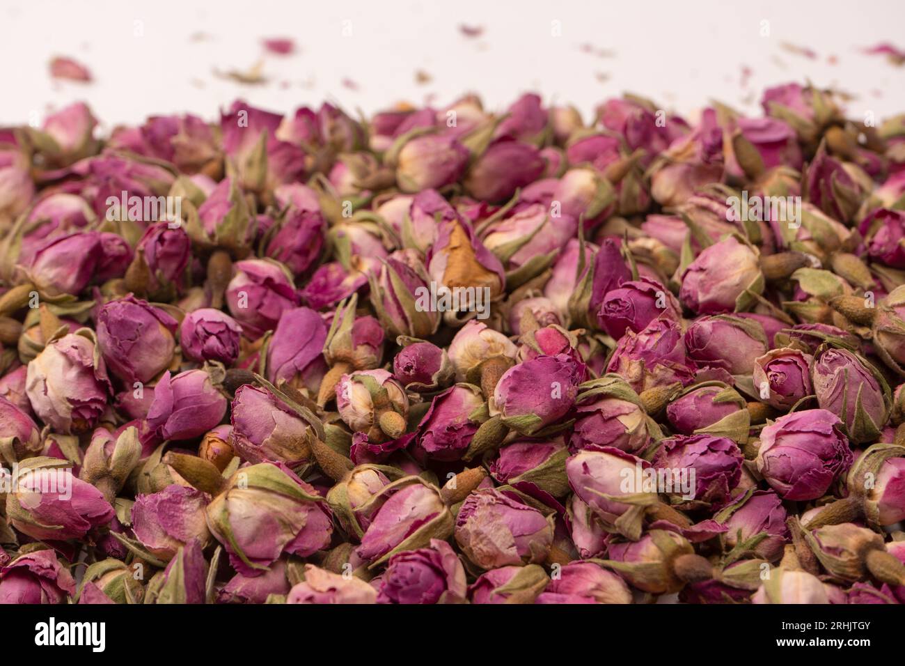Dry tea roses isolated on a white background Stock Photo - Alamy