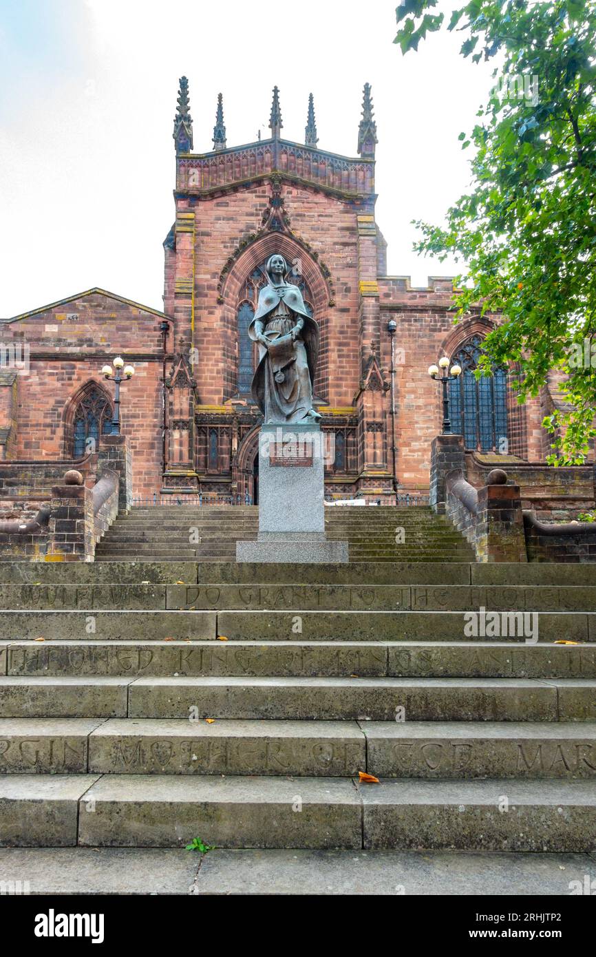 Bronze sculpture of Lady Wulfrun stands at the top of a stone staircase ...