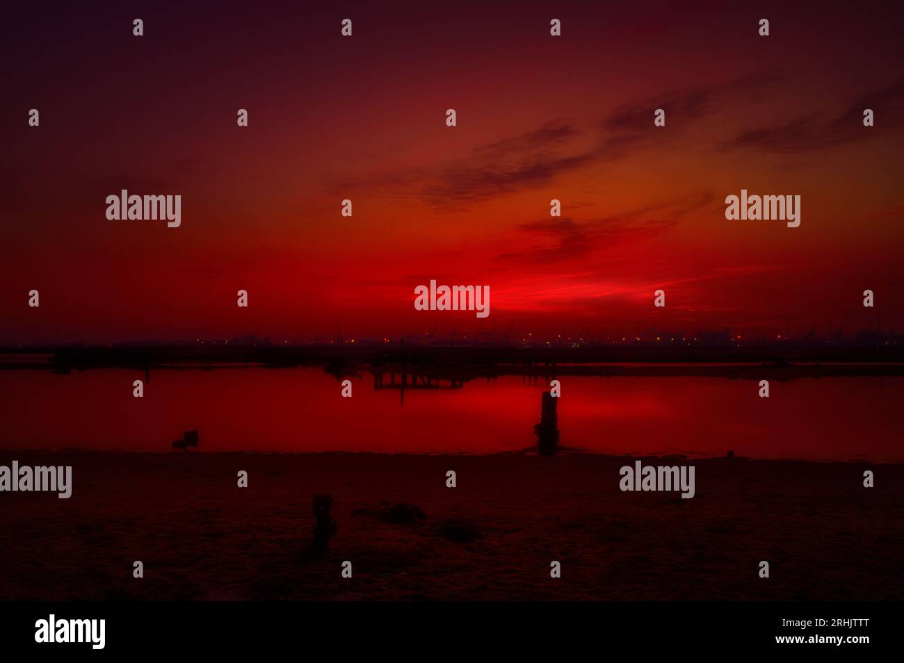 deep red sunset (like the hell) at Pialassa Piomboni Stock Photo - Alamy
