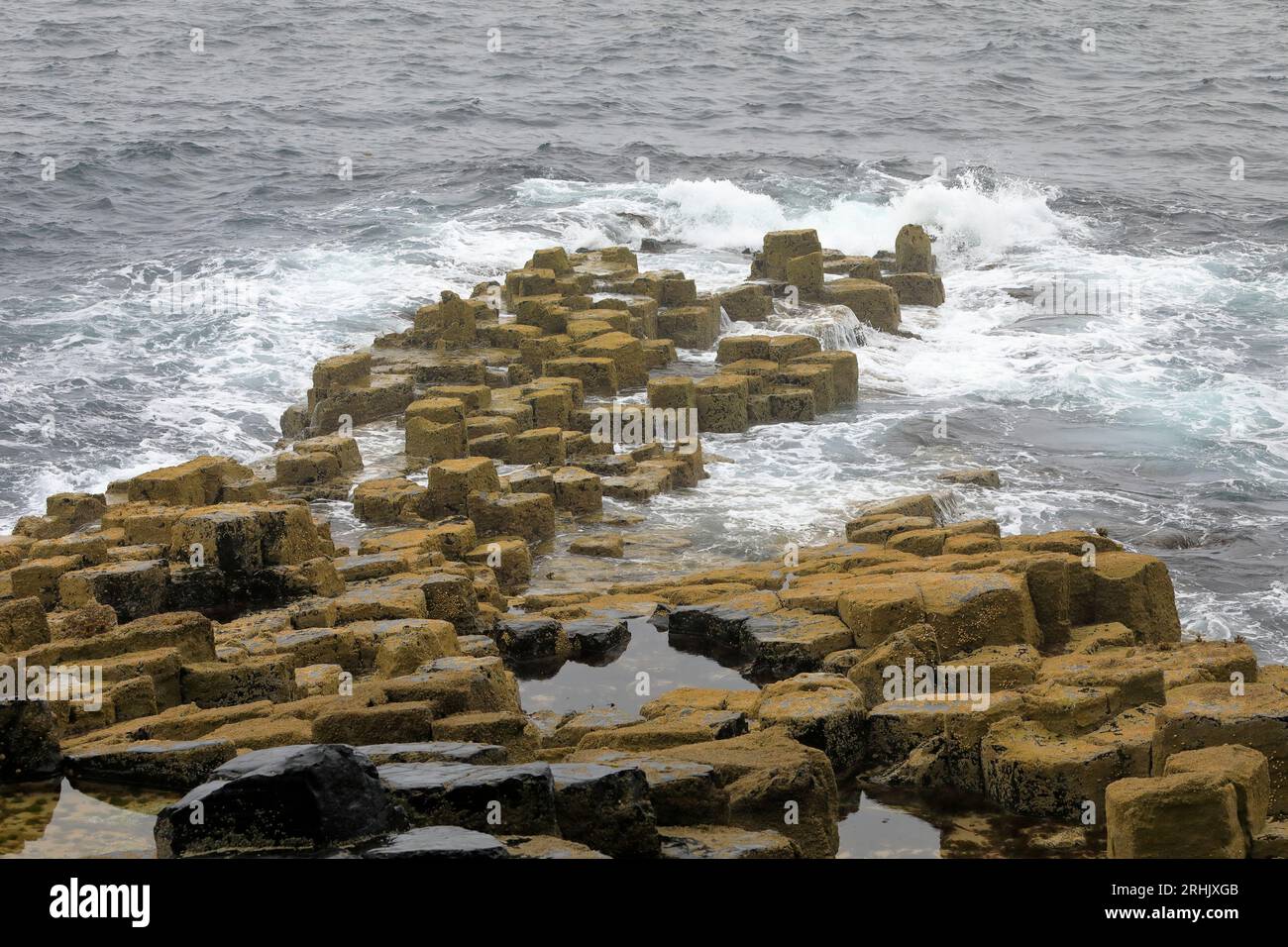 Hexagonal basalt rocks on the coast at Staffa near Fingal's Cave Stock ...