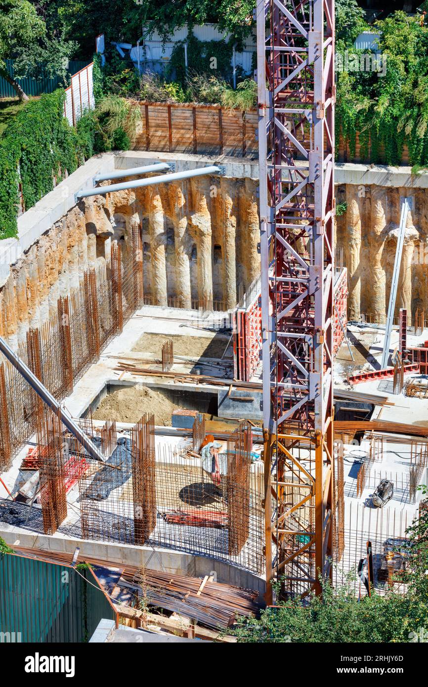 Powerful construction of the foundation of a new building with a ...