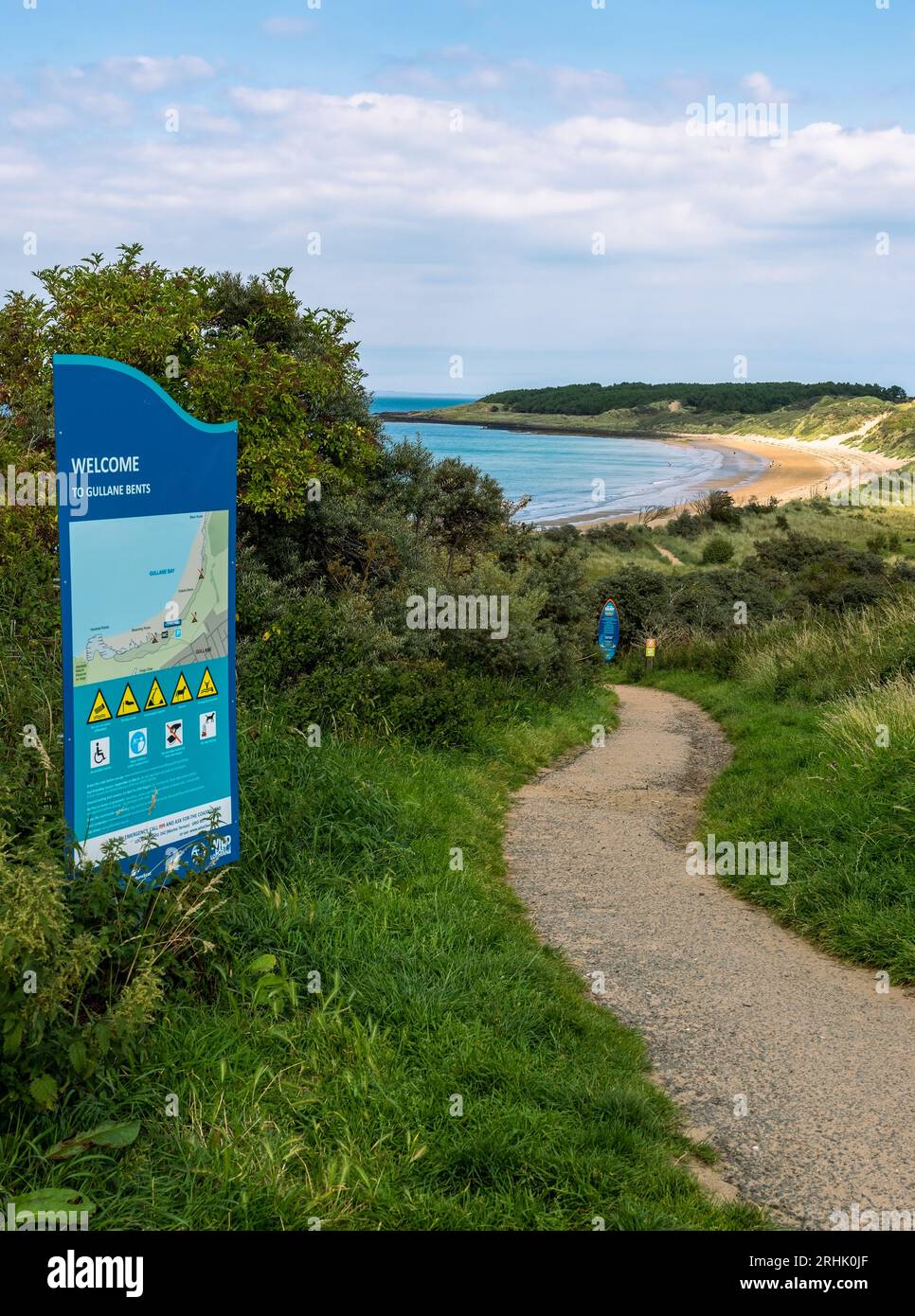 Sign with information on the local area with a path leading to Gullane ...