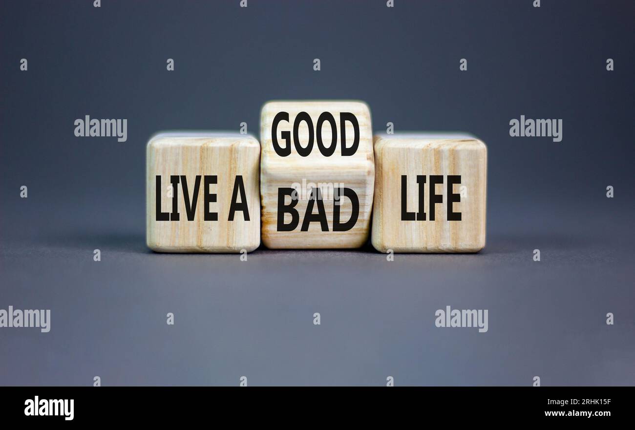 Live good life symbol. Concept word Live a good or bad life on wooden ...