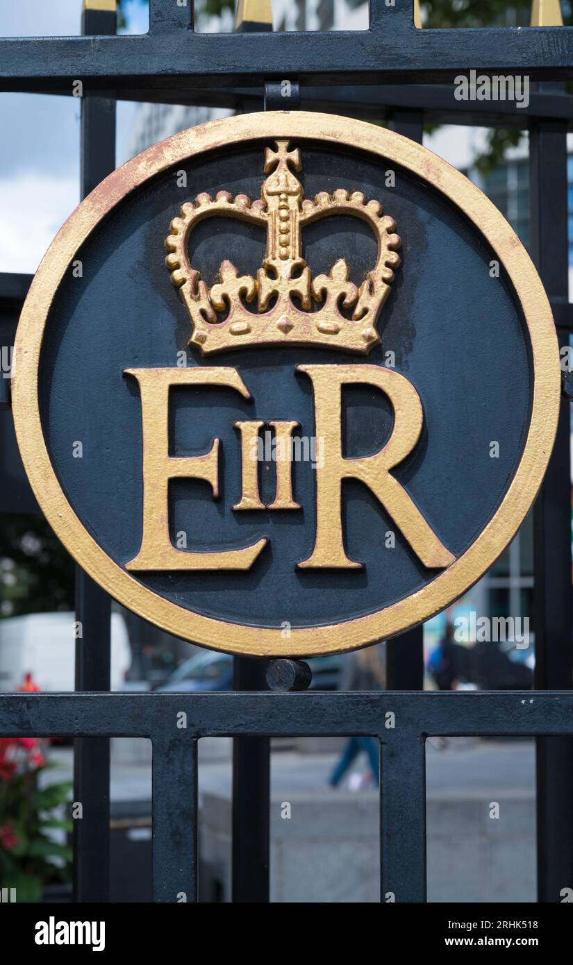 Cast metal EllR royal cypher of Queen Elizabeth II on a gate outside ...