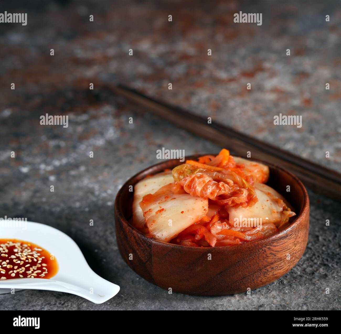 traditional cabbage fermented kimchi in a wooden bowl Stock Photo - Alamy