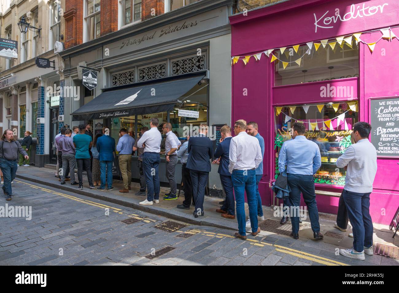 City workers queue at lunchtime to buy takeaway food from Porterford ...