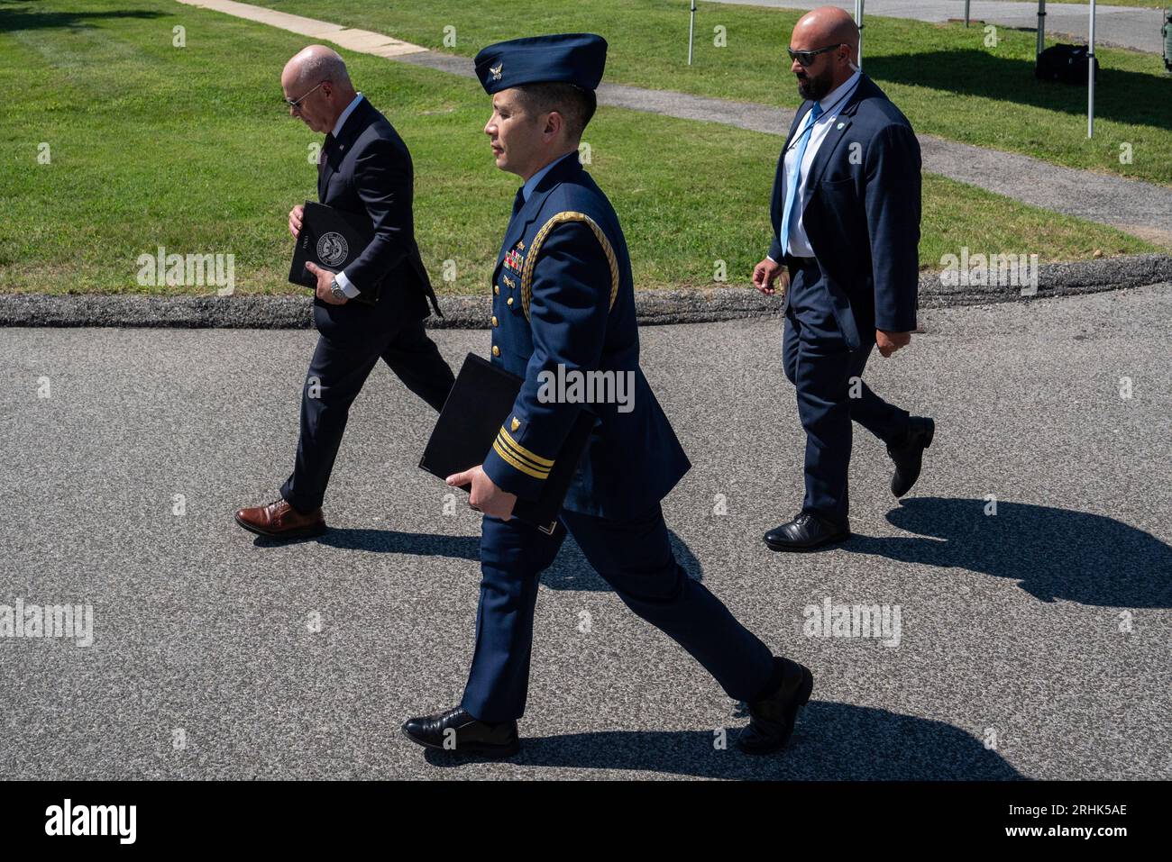 Homeland Security Secretary Alejandro Mayorkas, left, departs from a ...