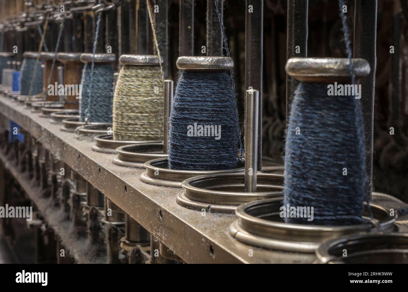 string spools of a historic weaving machine Stock Photo - Alamy