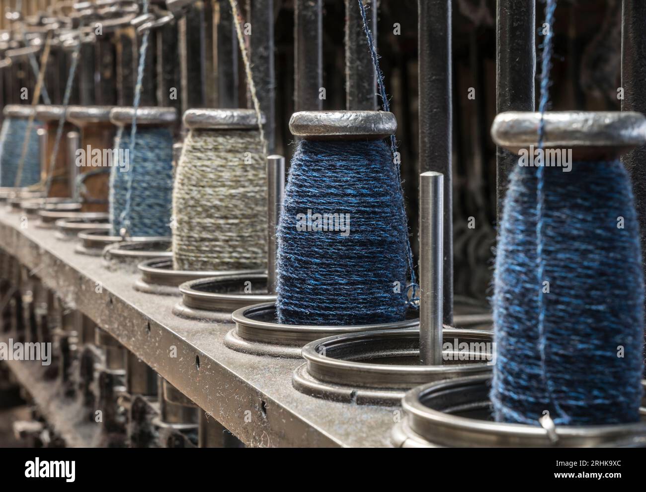 string spools of a historic weaving machine Stock Photo - Alamy