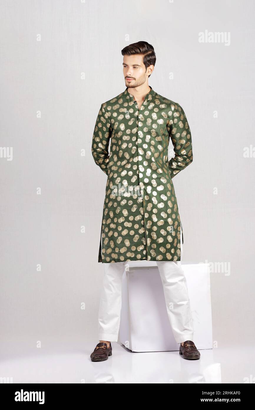 MALE MODEL POSING IN PAKISTANI TRADATIONAL DRESS Stock Photo - Alamy
