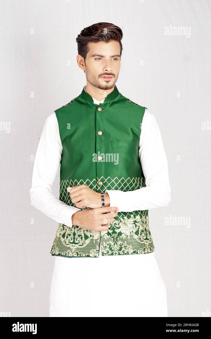 MALE MODEL POSING IN PAKISTANI TRADATIONAL DRESS Stock Photo - Alamy