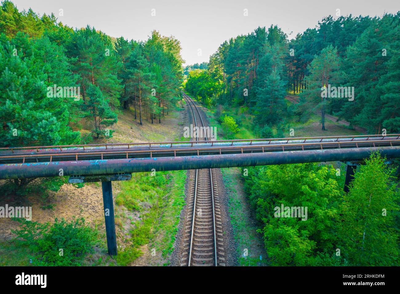 Aerial view of an abandoned pedestrian bridge over the railway. The ...