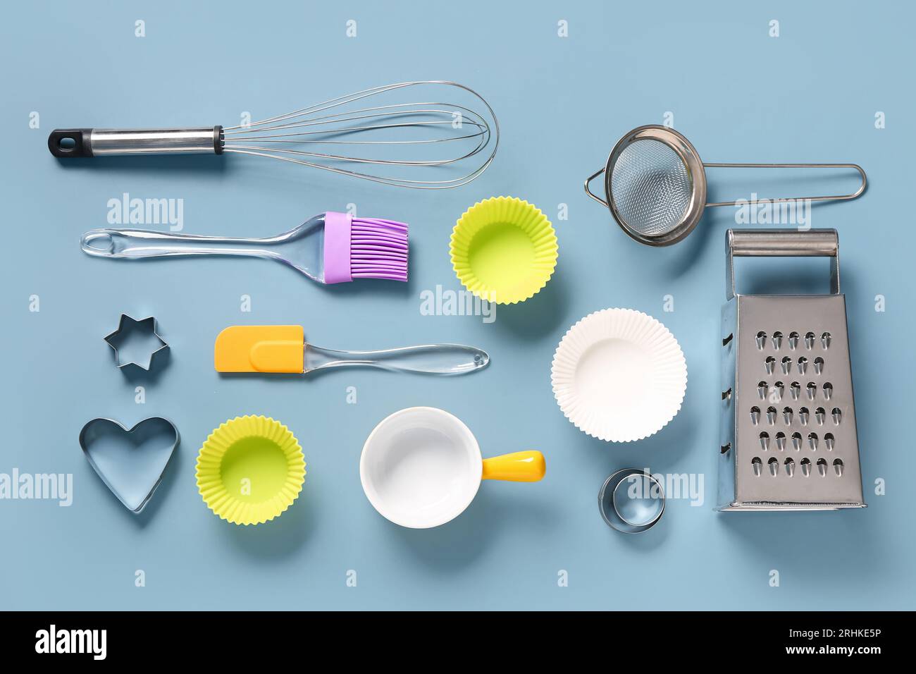 Baking utensils on blue background Stock Photo - Alamy