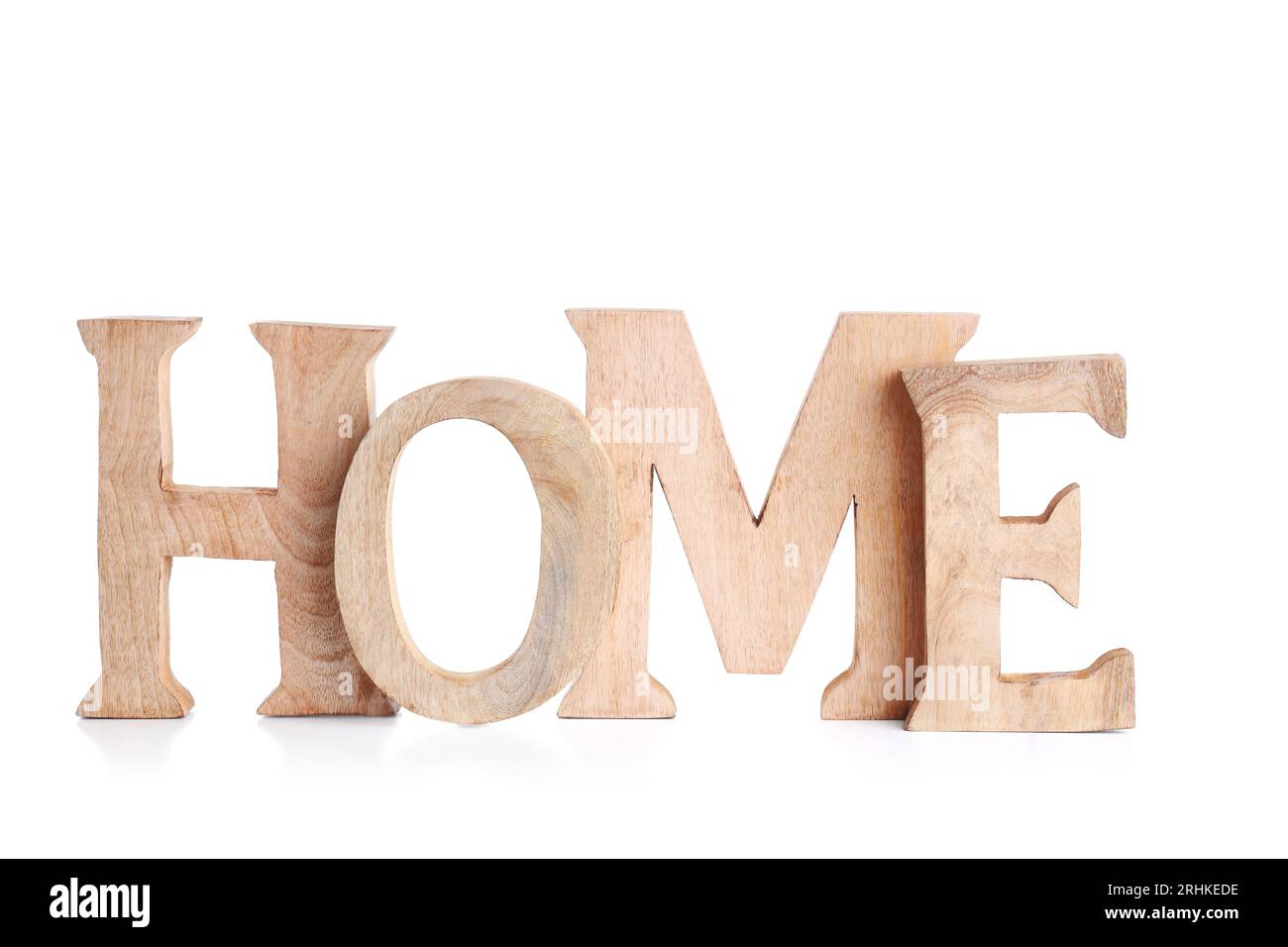 Decorative wooden letters forming word HOME isolated on white ...