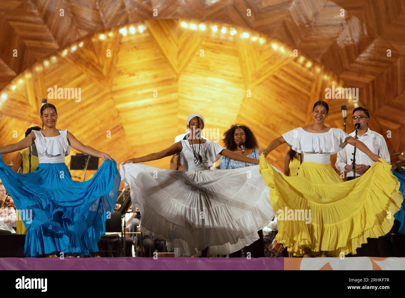 Puerto Rican dancers perform with the Boston Landmarks Orchestra at the ...