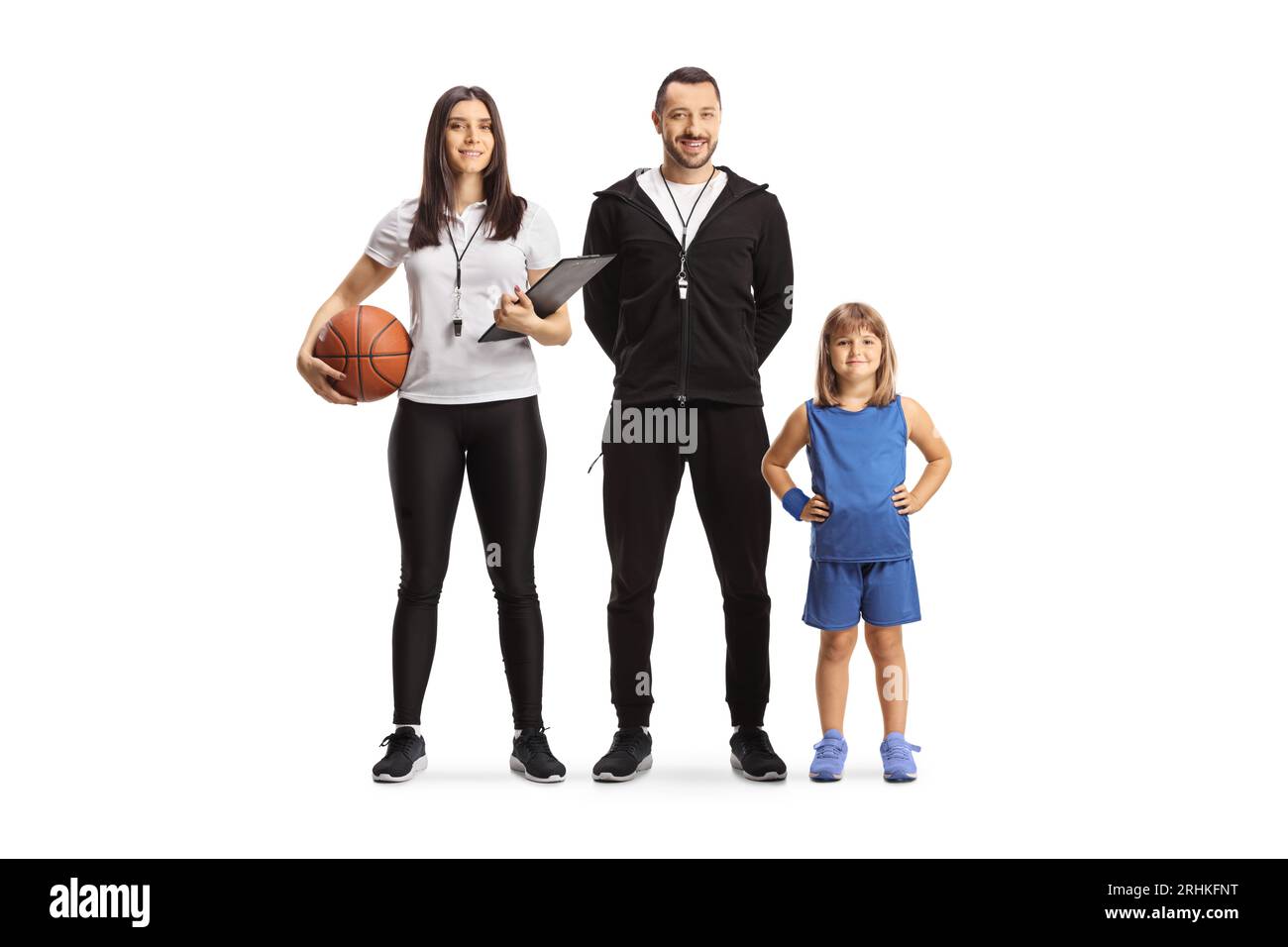 Basketball coaches posing with a little girl isolated on white ...