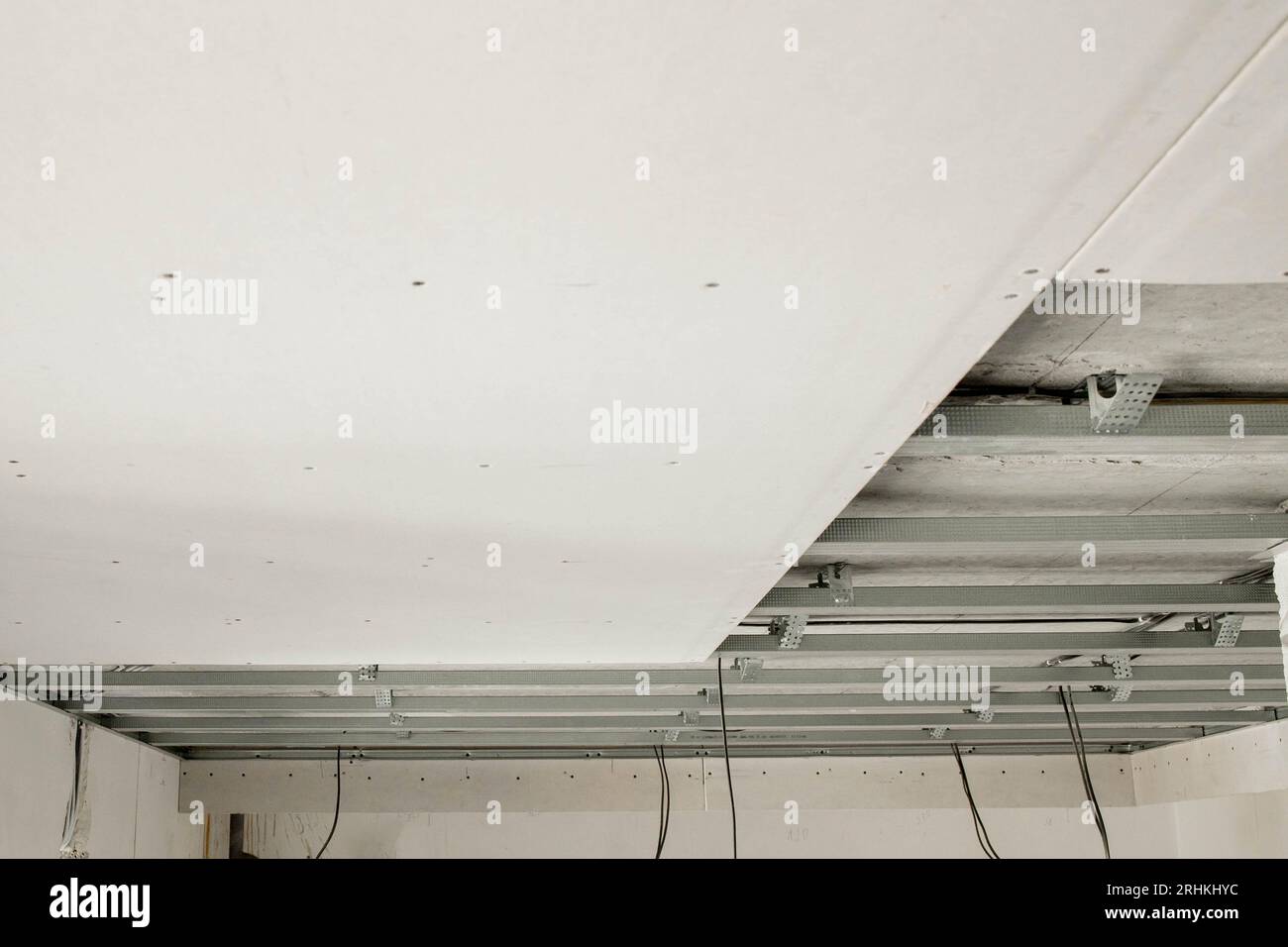 Suspended ceiling structure with profiles for installation of ceiling ...