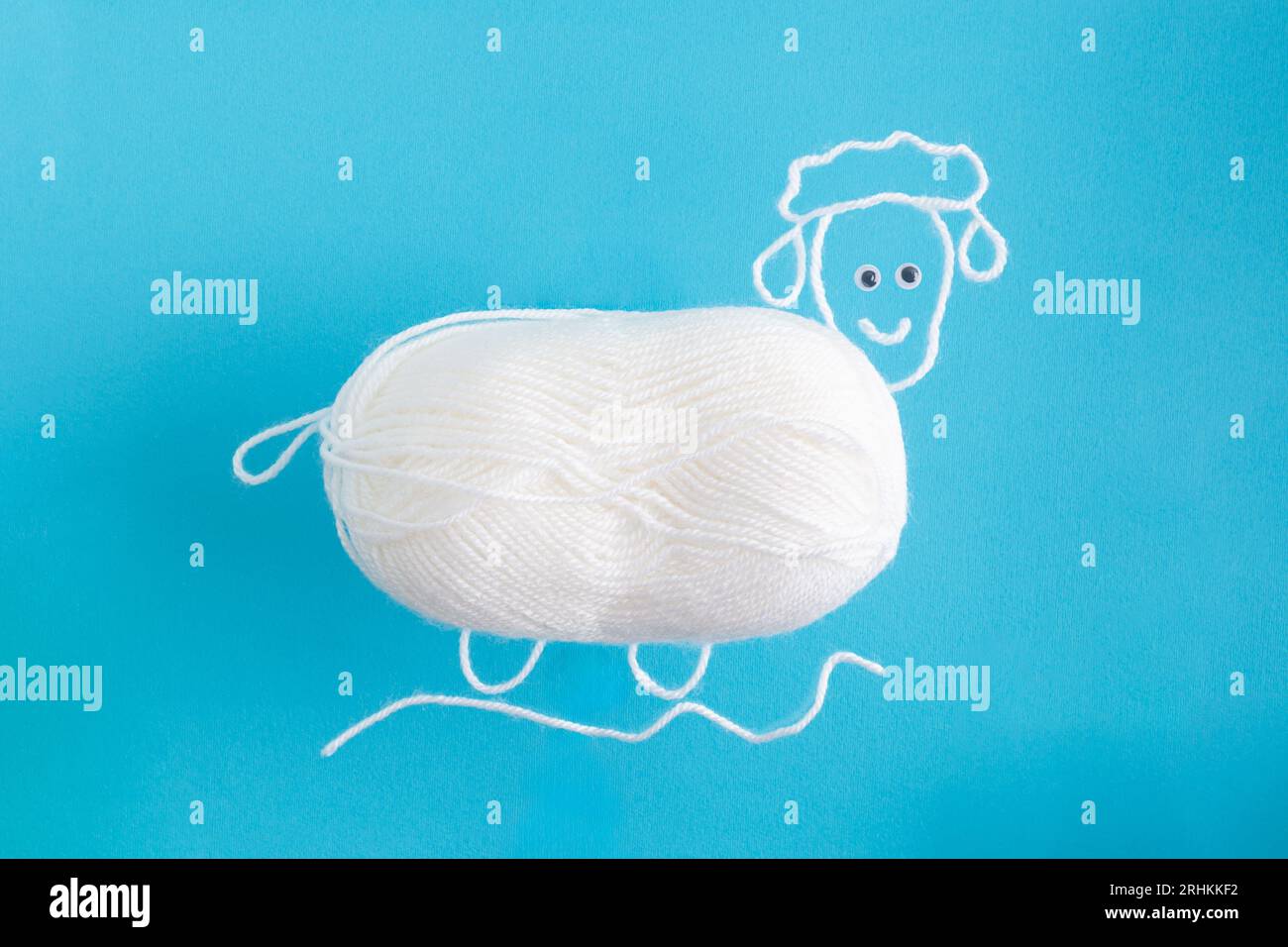 Drawing of sheep from wool threads with ball integrated knitting ...