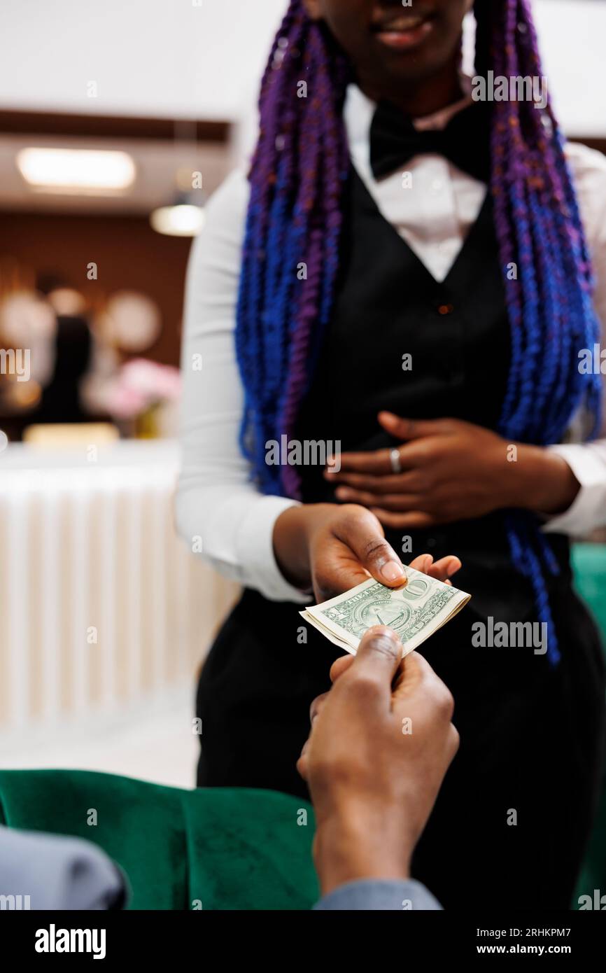 American hotels tipping hi-res stock photography and images - Alamy