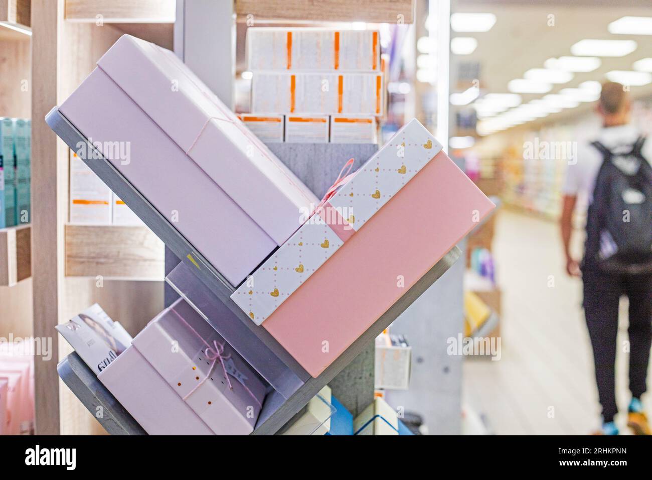 different sizes of gift wrappings on the shelves in the supermarket ...