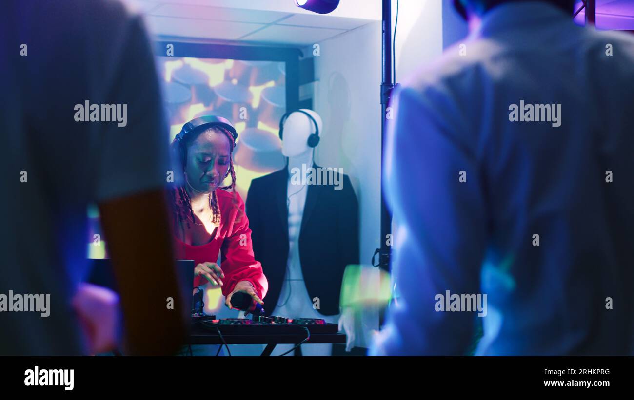 Diverse group of friends clubbing at event, partying together on modern ...