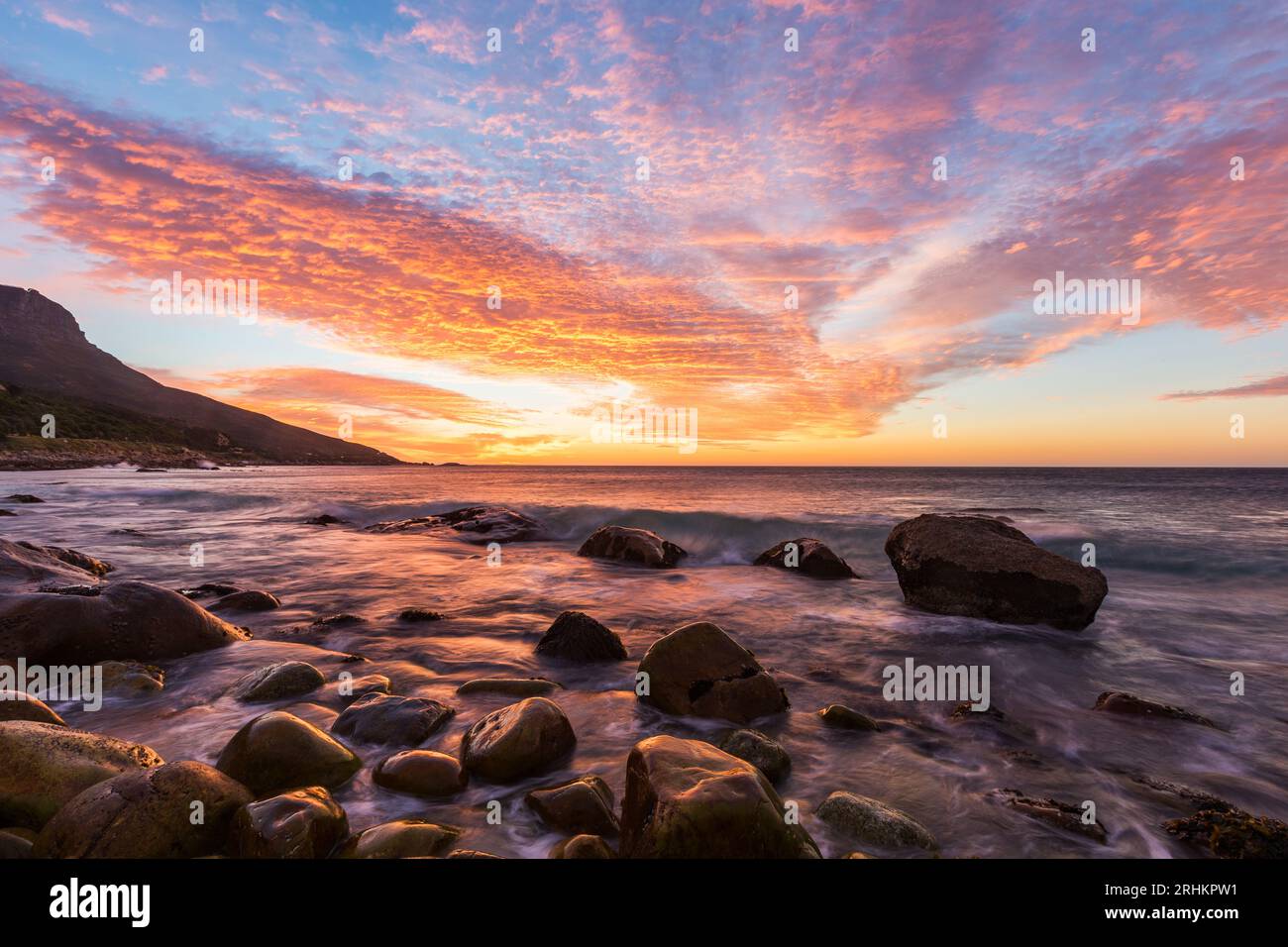 Beautiful pink sunset landscape photography of Atlantic Ocean in Cape ...