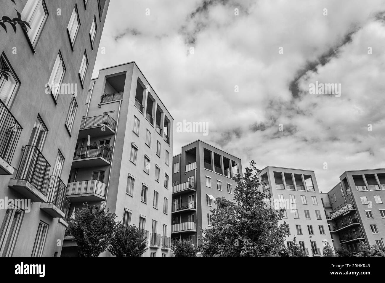 Low angle view of apartment buildings in black and white Stock Photo ...